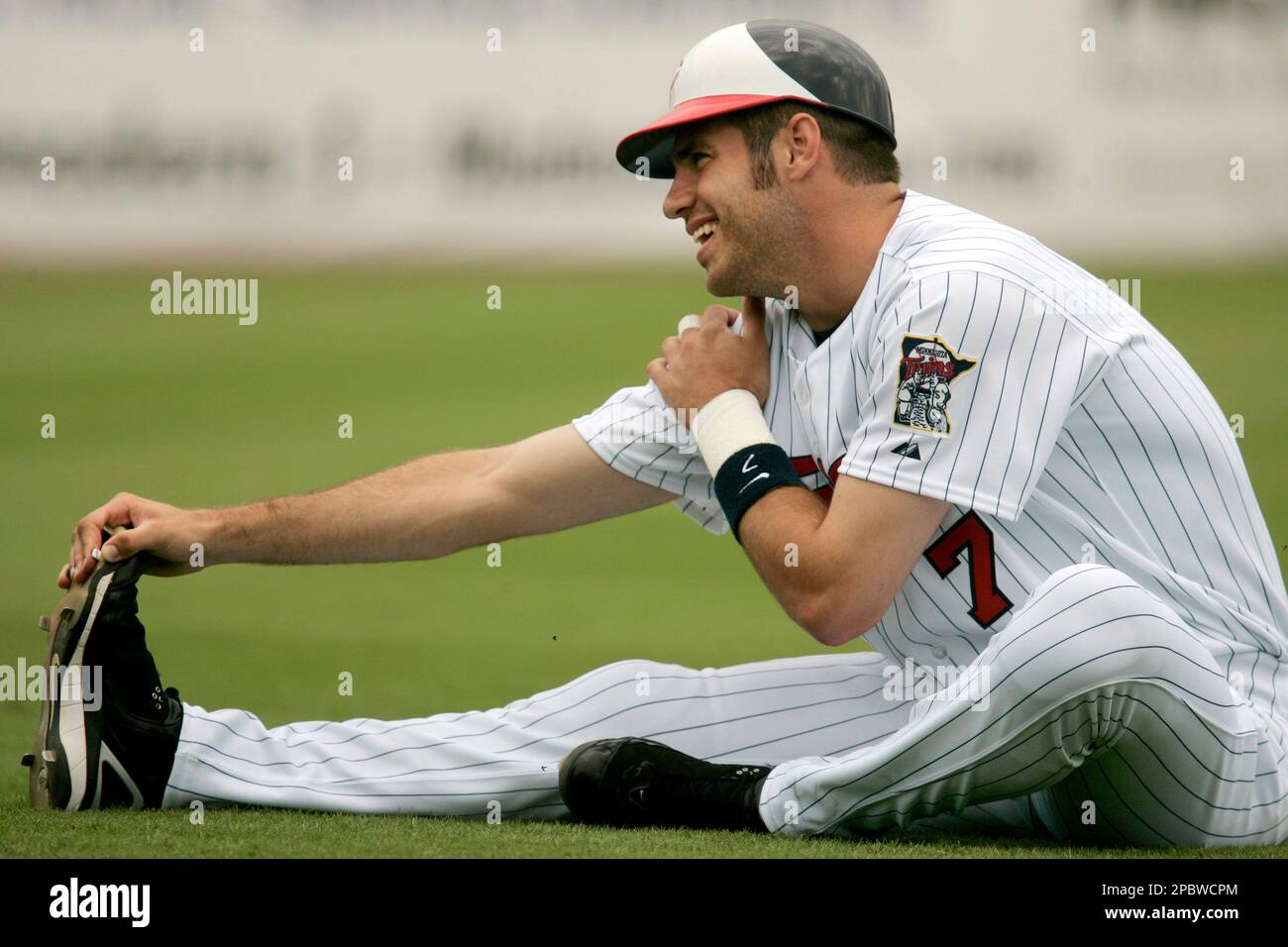 Minnesota Twins catcher Joe Mauer stretches moments before the start of ...