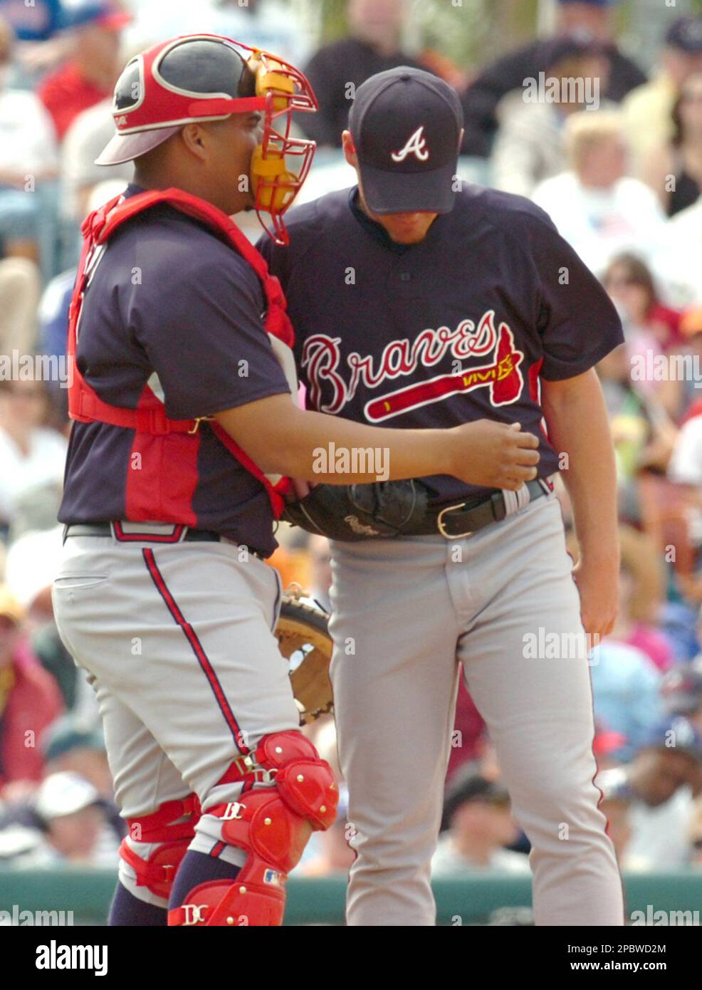 Atlanta Braves catcher Brayan Pena, left, talks to his pitcher Chuck ...