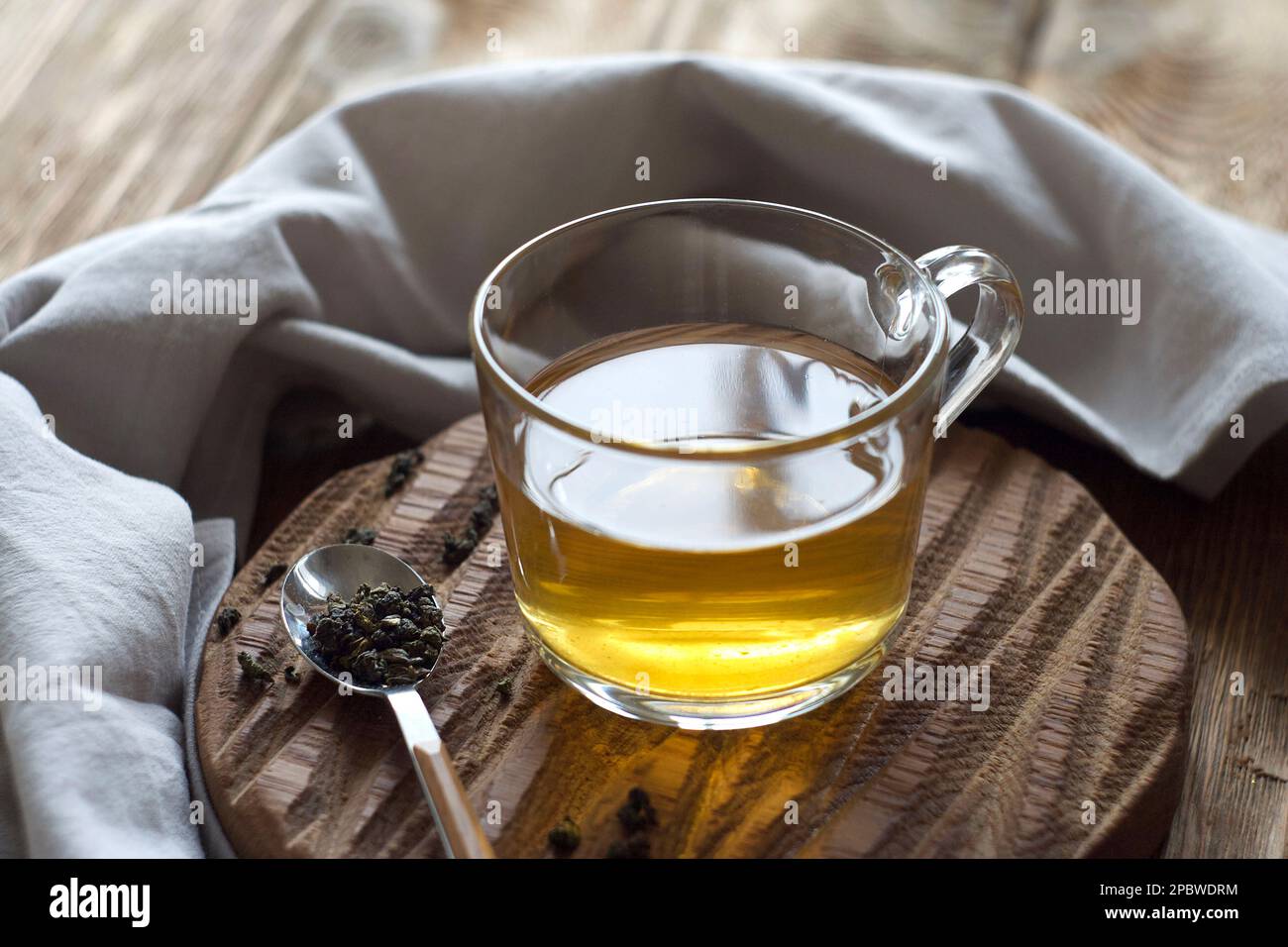 green tea in a transparent mug Stock Photo - Alamy