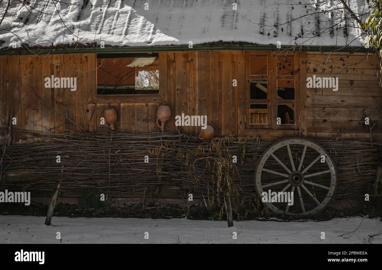 Facade of ancient wooden log house. Georgian Village house old w Stock ...