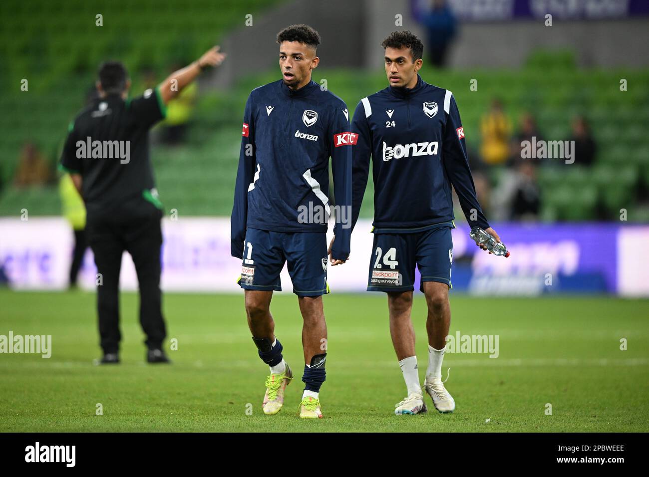 Ben Folami (left) and Nissan Velupillay of Melbourne Victory are seen ...