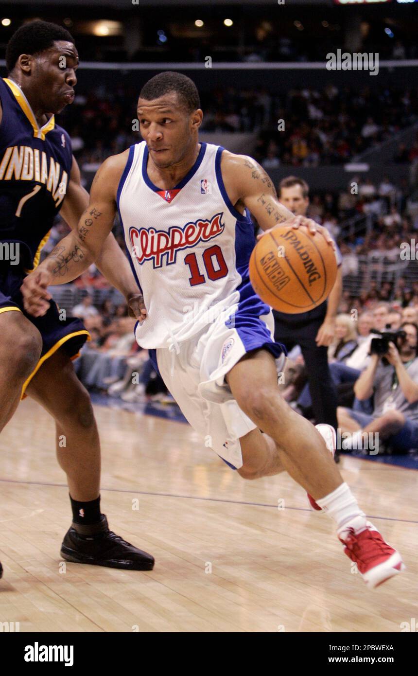 Los Angeles Clippers guard Will Conroy (10) drives past Indiana Pacers ...