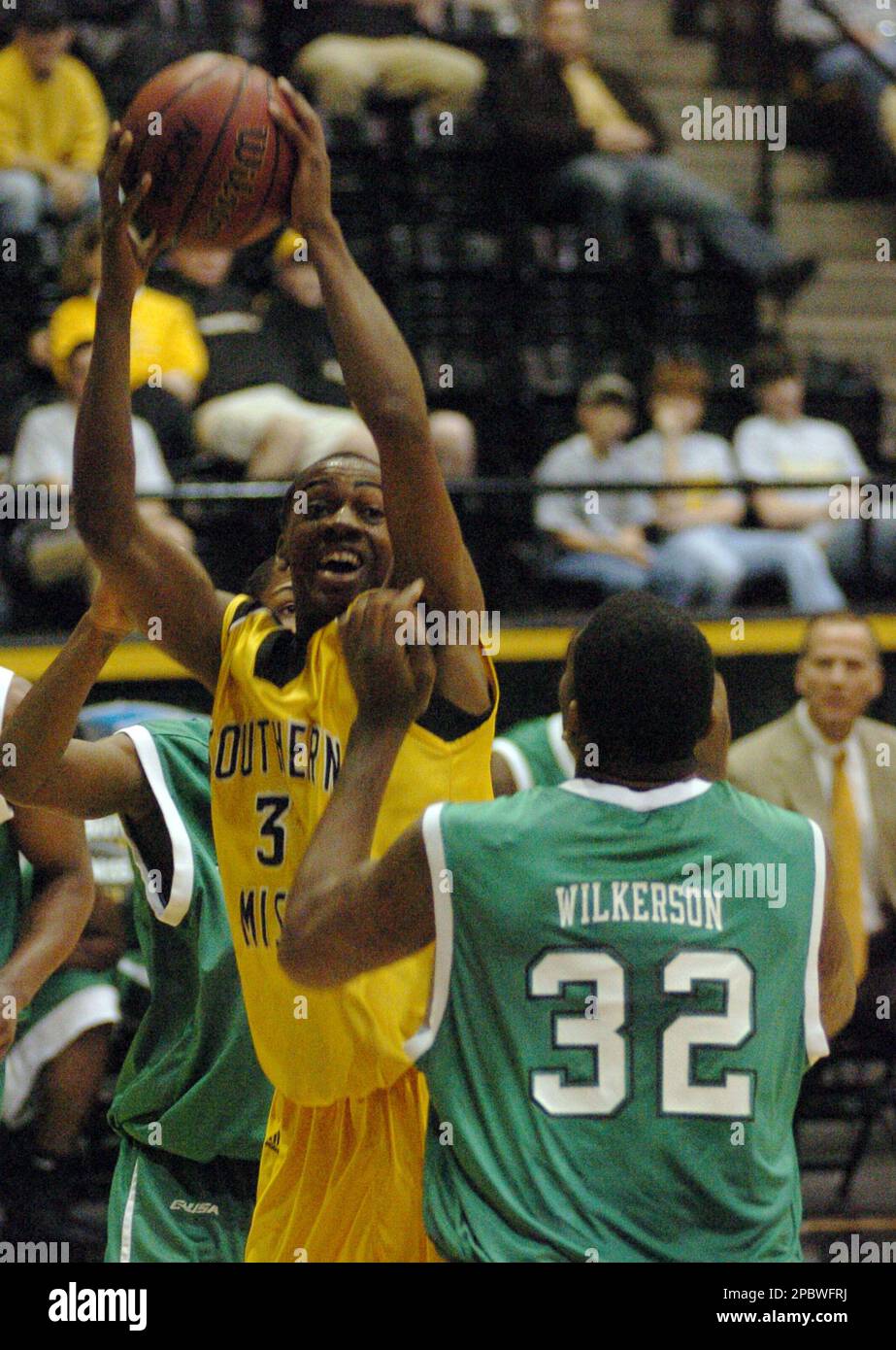 Southern Mississippi guard Jeremy Wise, left, shoots over Marshall ...
