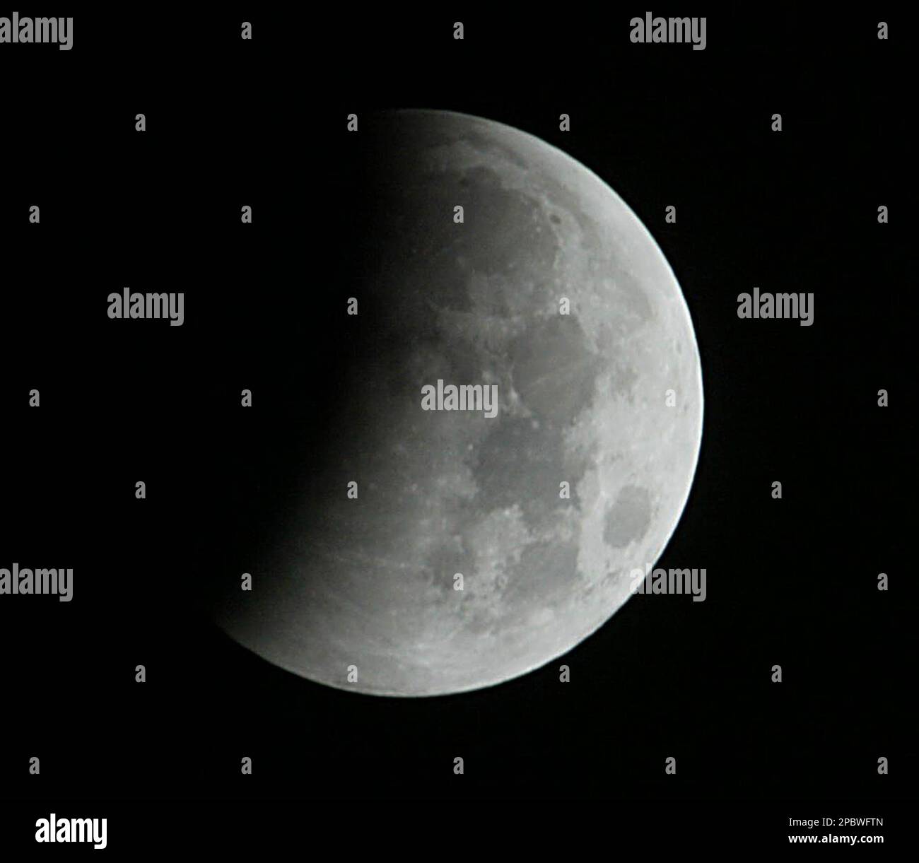 ** THIRD OF FOUR PHOTOS ** The moon is seen during a lunar eclipse in ...