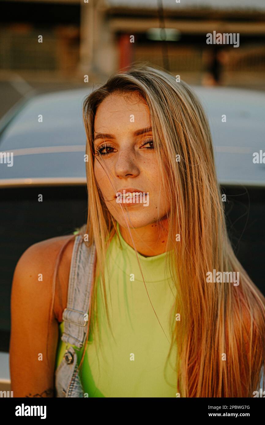 Beautiful young blonde woman with long hair smiling, close-up po Stock ...