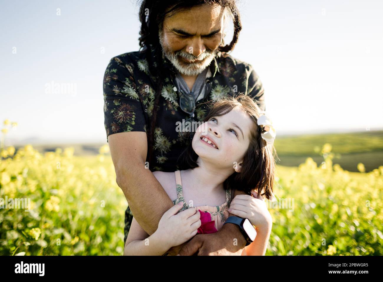 Uncle & Niece Embrace in Flower Field in San Diego Stock Photo - Alamy