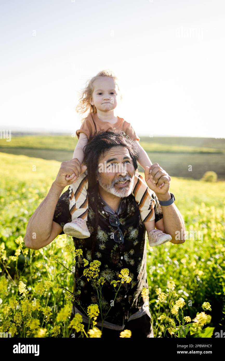 Uncle & Two Year Old Niece in Flower Field in San Diego Stock Photo - Alamy