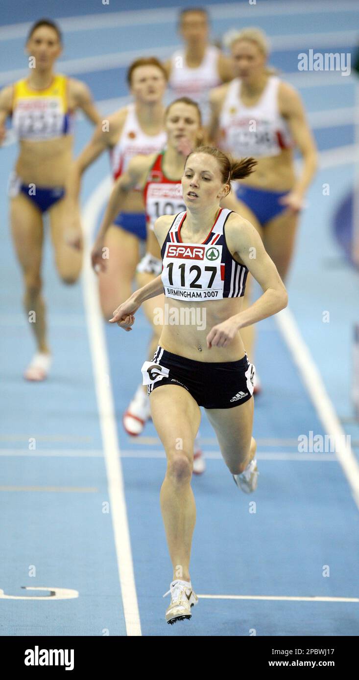 Britain's Nicola Sanders crosses the finish line to win the gold medal ...