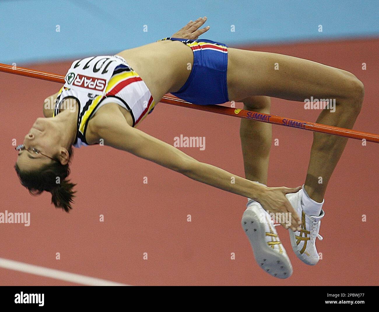 Belgium's Tia Hellebaut clears the bar on her way to winning the gold ...