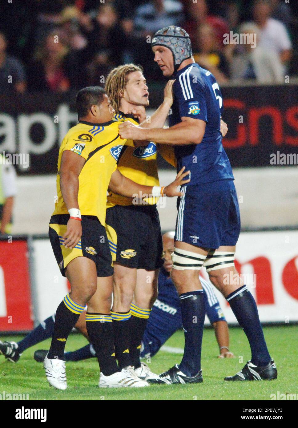 New Zealand Hurricanes' David Smith, left, and Cory Jane pick on South ...