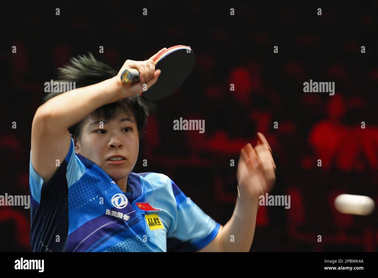 Singapore. 13th Mar, 2023. Wang Yidi of China hits a return during the ...