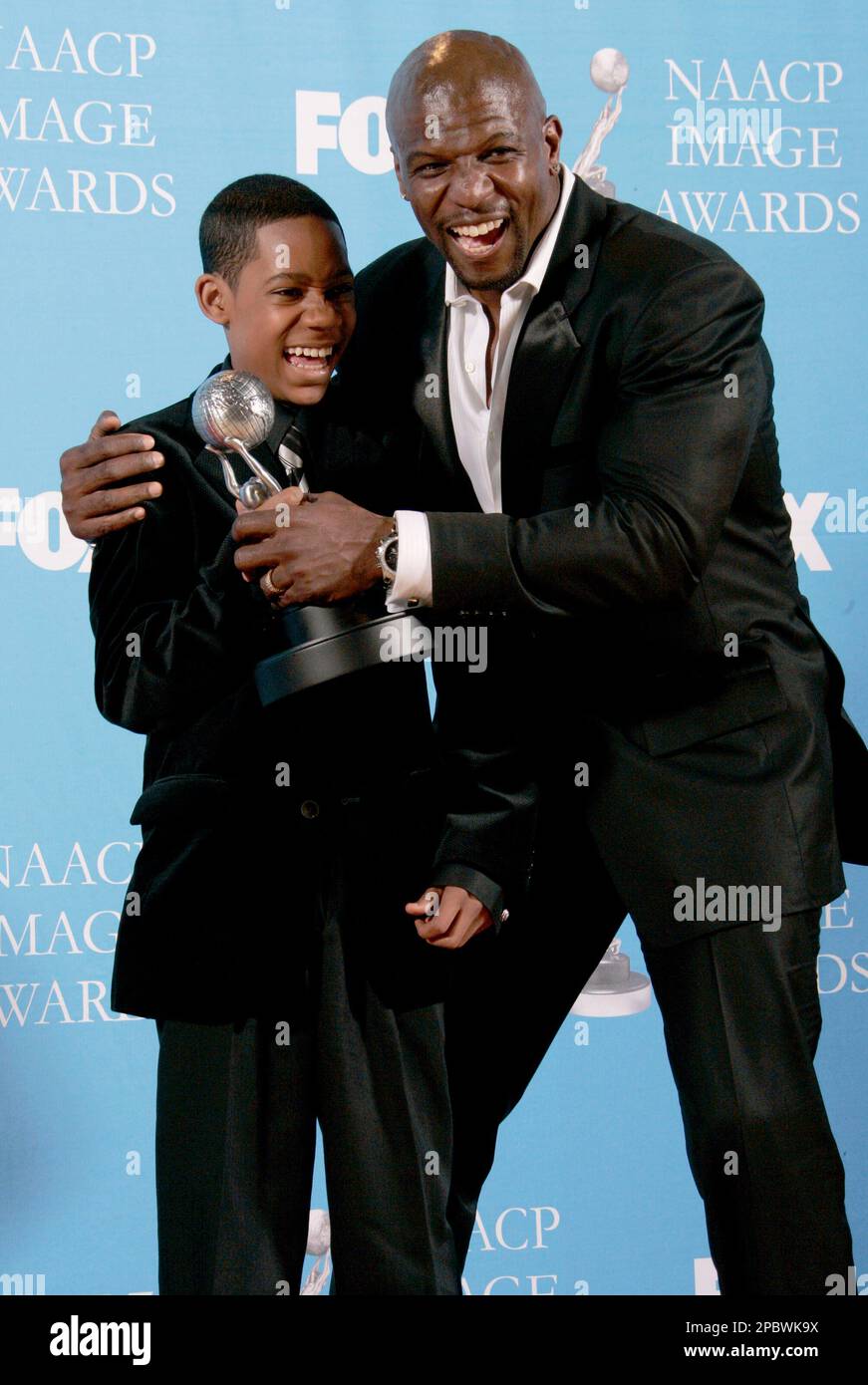 With cast member Terry Crews, Tyler James Williams holds the award for ...