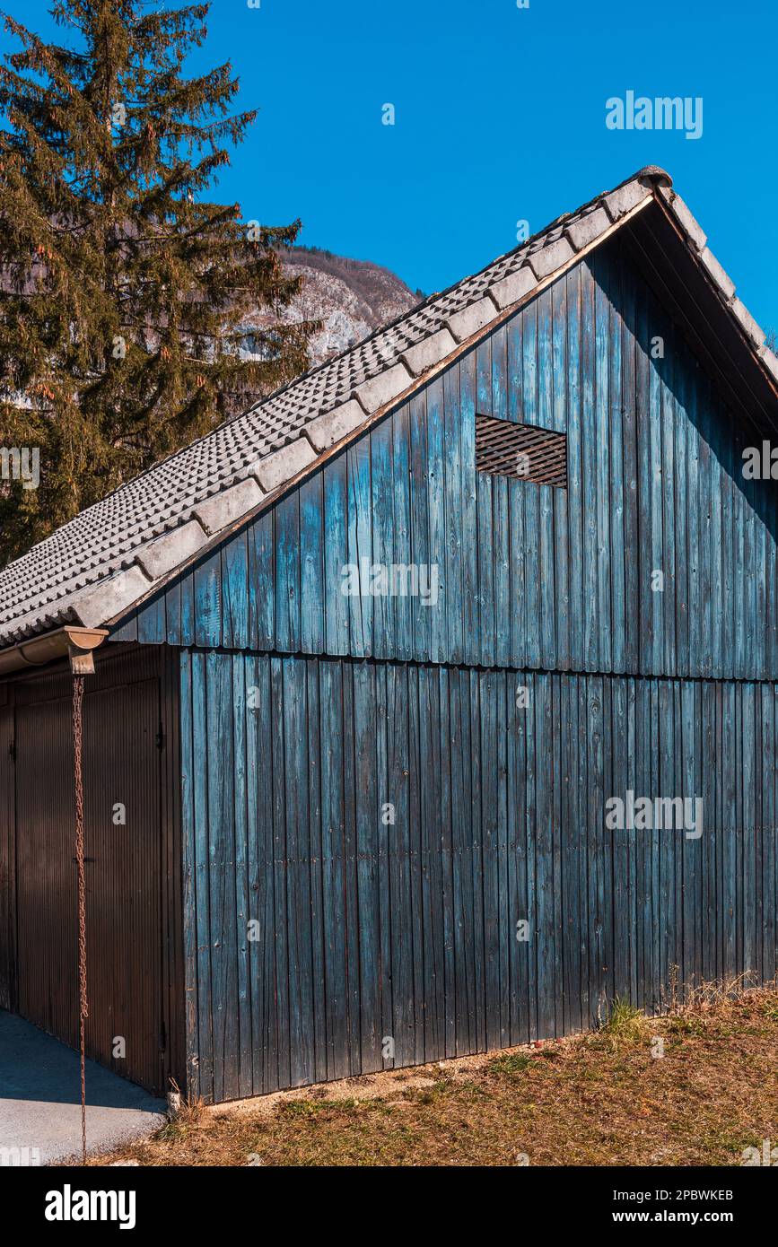 Wooden shed with concrete roof tile in winter Stock Photo - Alamy