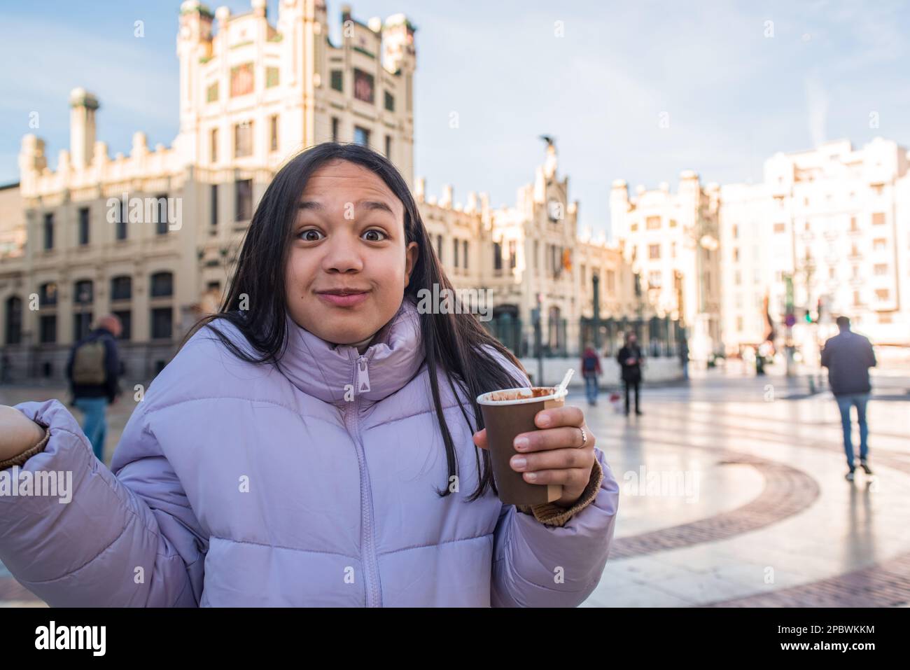 Brunette teenager with raised arms expression astonishment Stock Photo ...