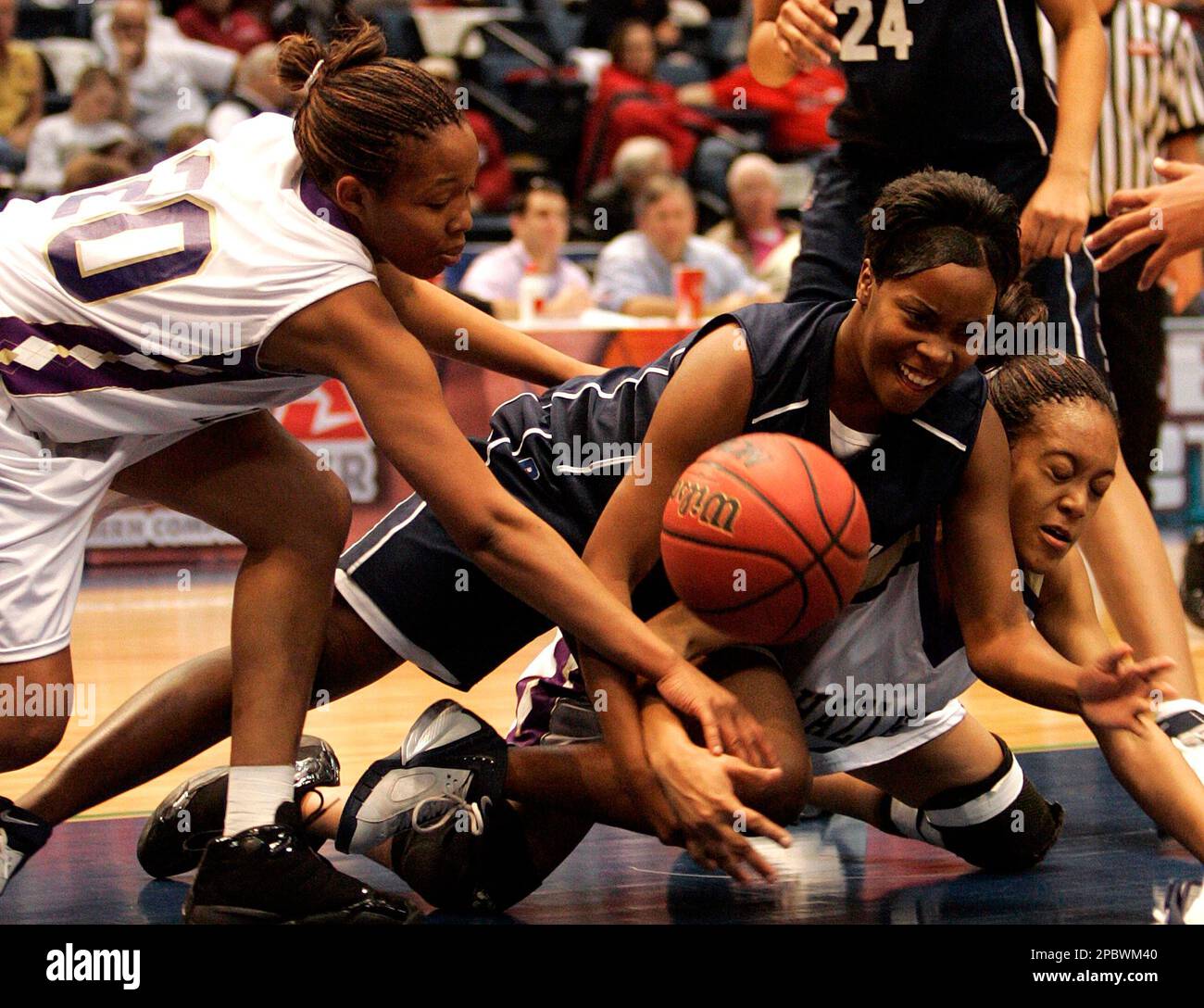 Hazlewood's Naughtia Langham (20) and Jasmine Patton, right, fight for ...