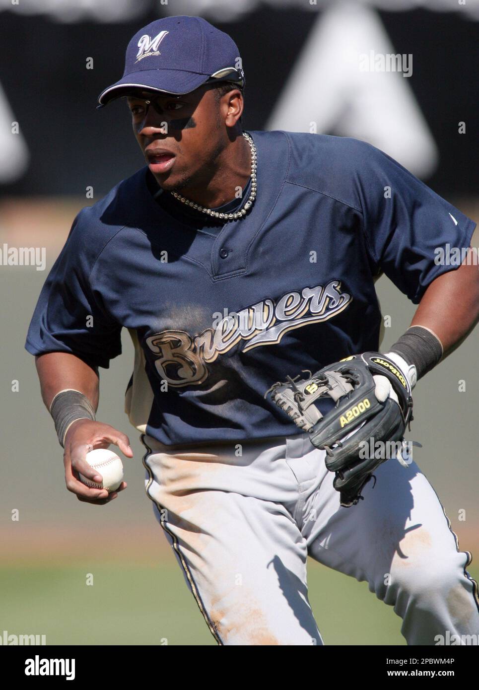 Milwaukee Brewers second baseman Rickie Weeks fields a grounder before ...