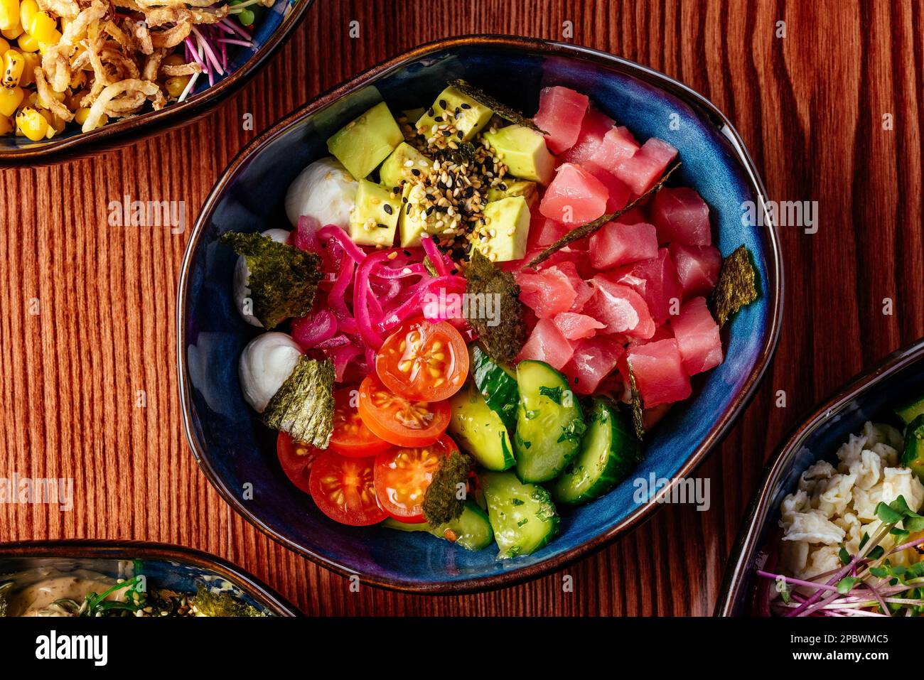 hawaiian poke bowl with tuna, vegetables, rice Stock Photo - Alamy