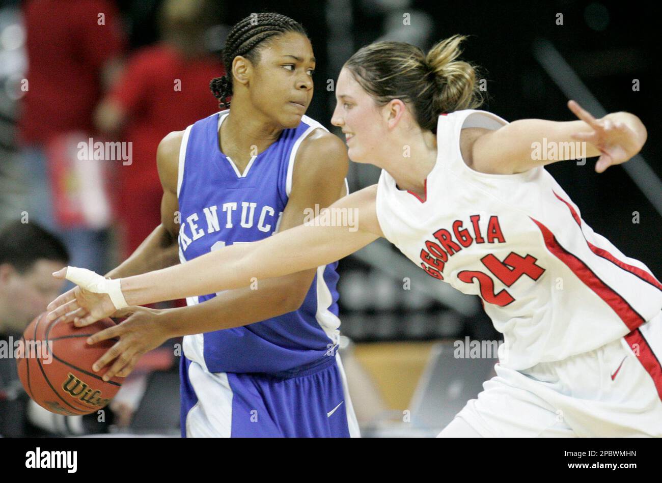 Georgia's Megan Darrah, right, tries to strip the ball from Kentucky's ...