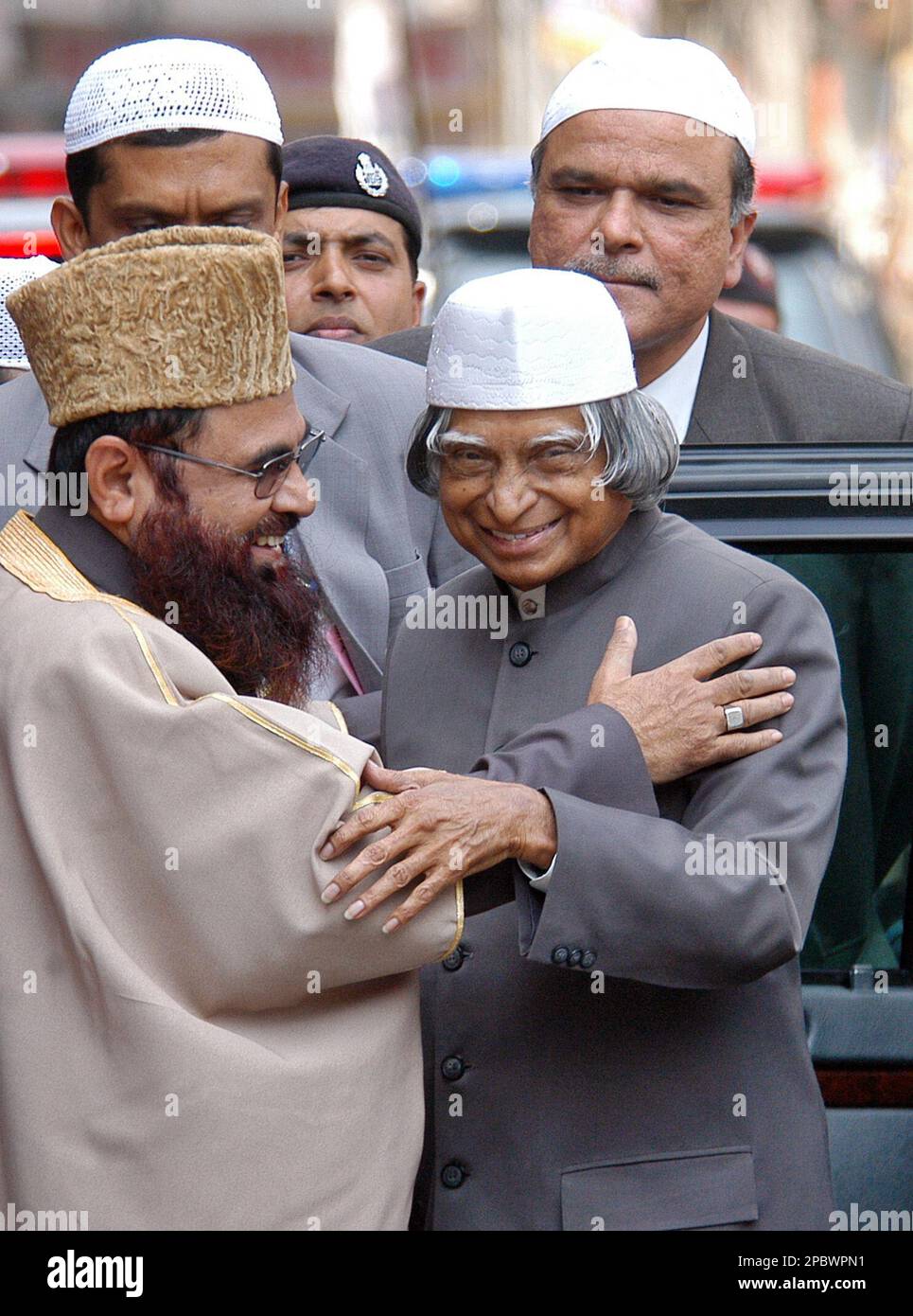 Indian President A.P.J. Abdul Kalam, front right, embraces Shahi Imam, or head priest, Mufti ...