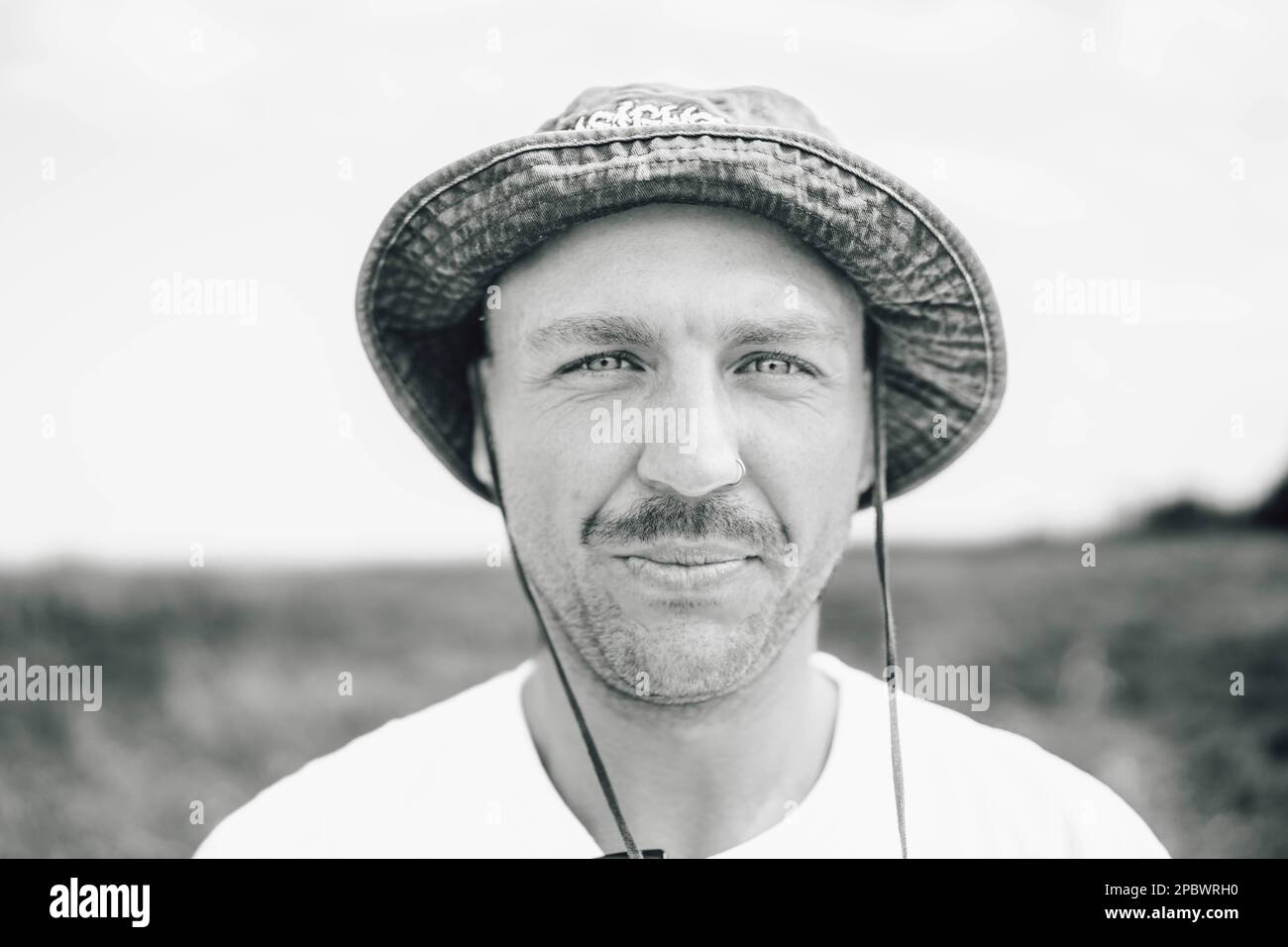 black and white portrait of white male with round hat Stock Photo - Alamy