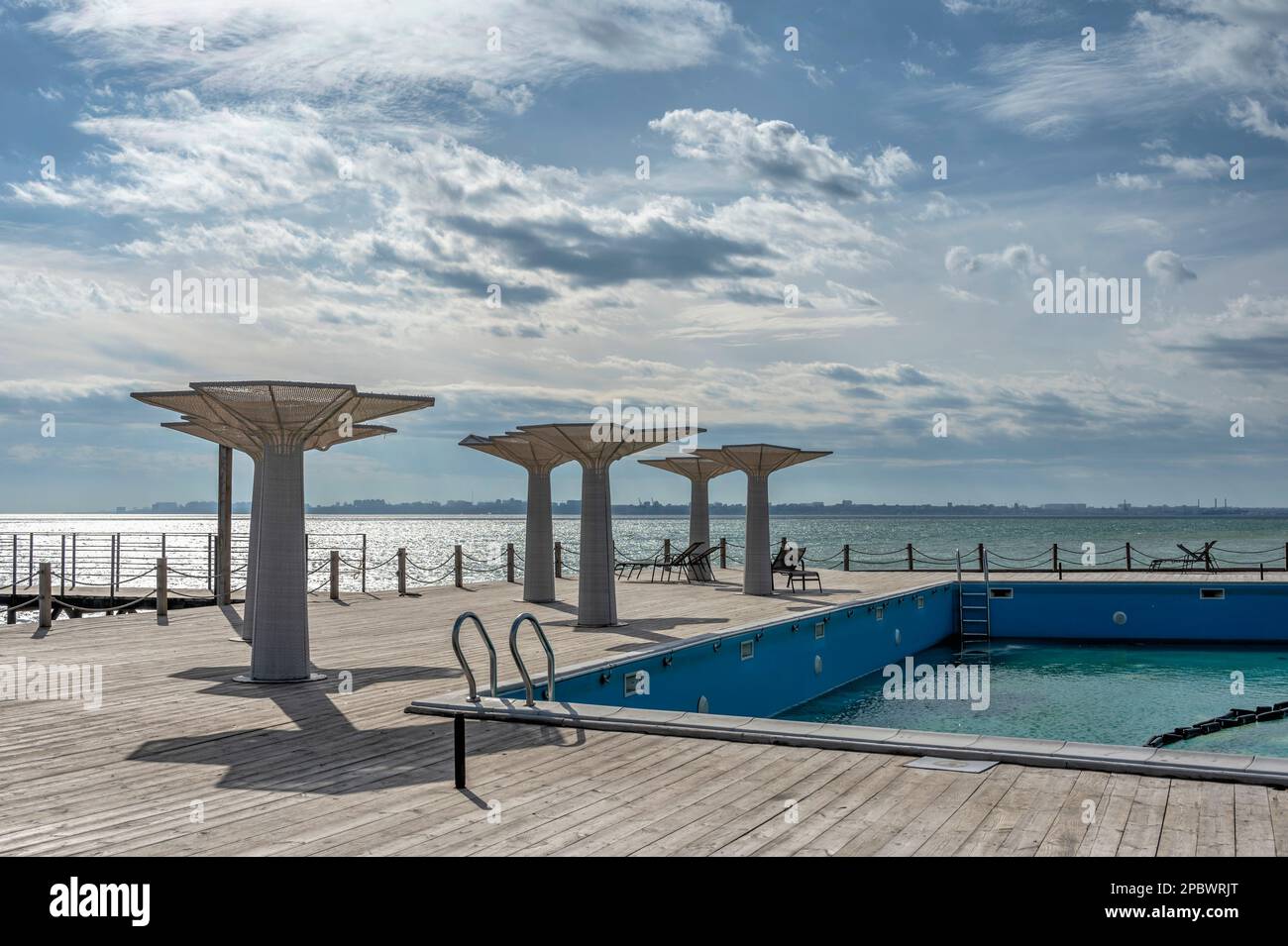 Relaxation area with pool on the beach Stock Photo - Alamy