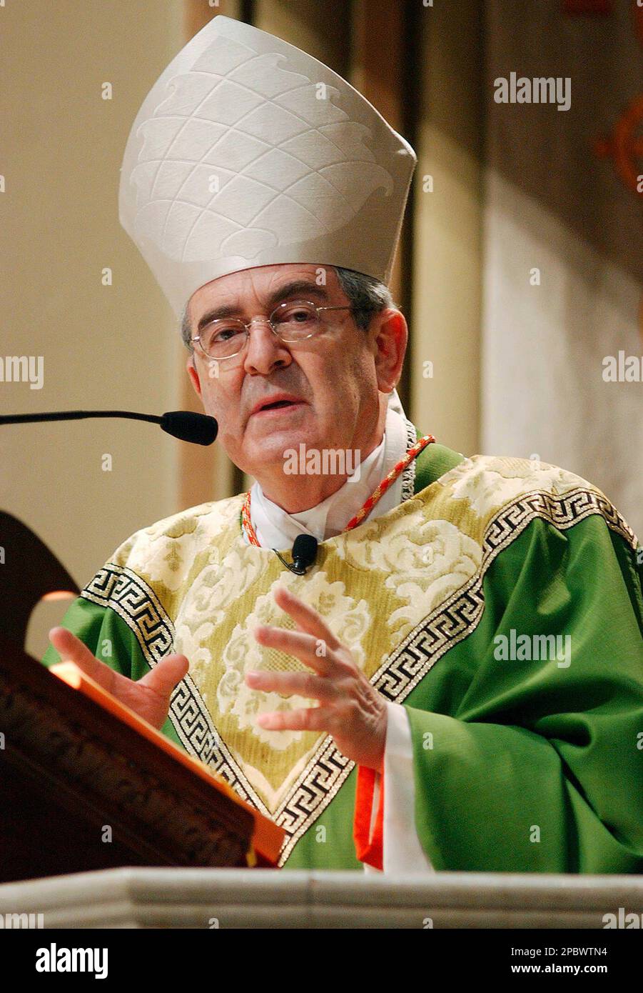 ** FILE ** Cardinal Justin Rigali speaks during his first mass at the ...