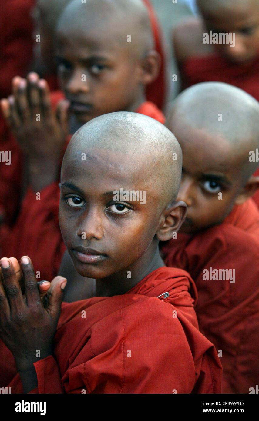 Novice Buddhist monks participate in an ordination ceremony of Samanera ...