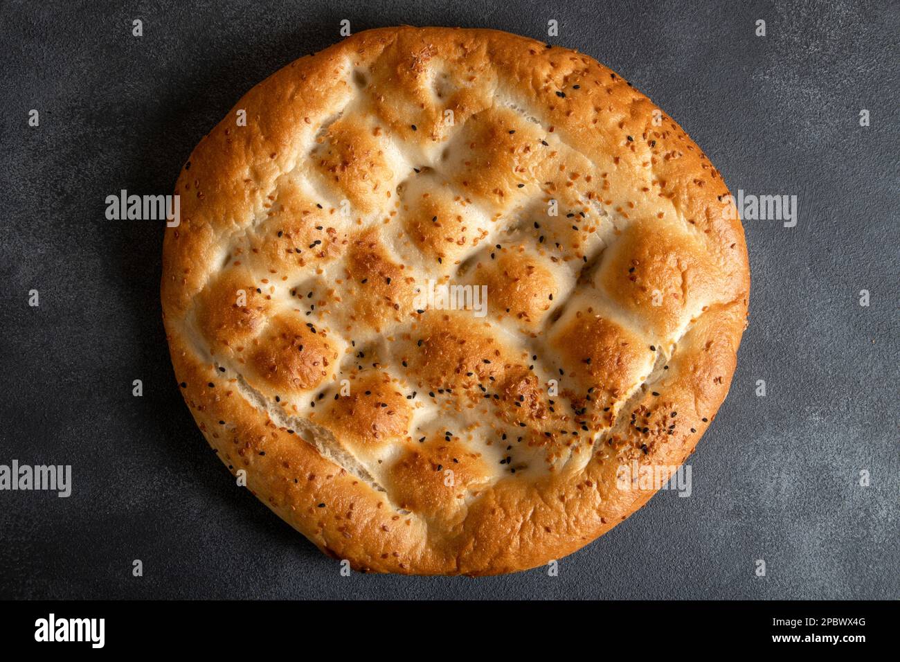 Traditional Ramadan pita on black background.Holy bread for Muslims ...