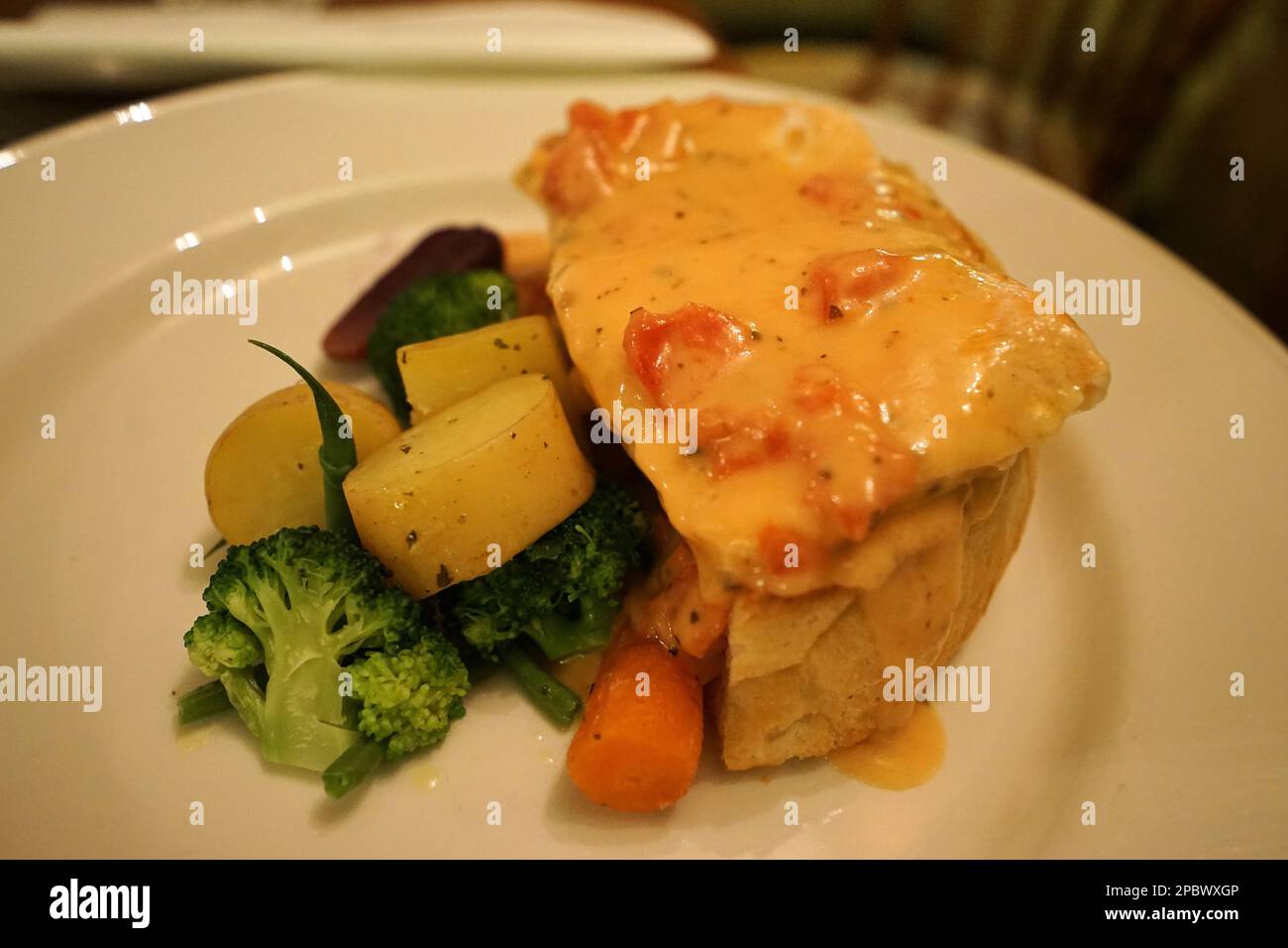 Close up Baked bun and local traditional British dishes served with ...