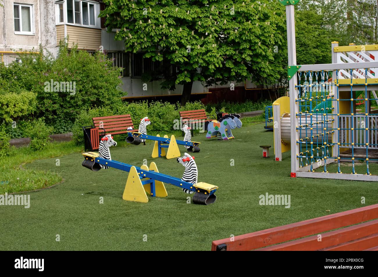 Empty childrens playground hi-res stock photography and images - Alamy