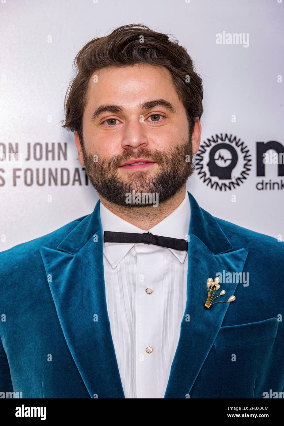 Jake Borelli arrives at the Elton John AIDS Foundation's 31st Annual ...