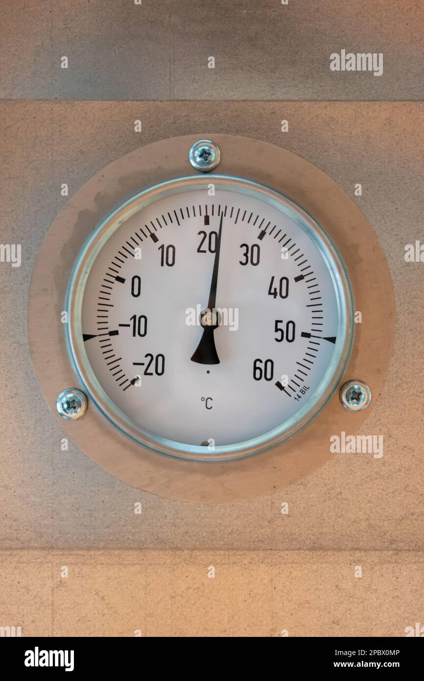 Old industrial round metal temperature gauge. Unbranded, Celsius scale ...