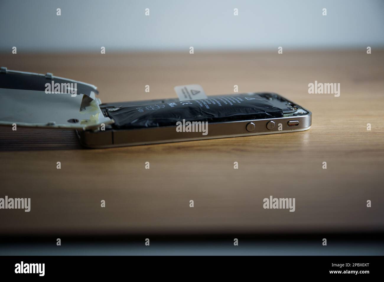 Kaunas, Lithuania - 2023 Marh 13: Iphone with exploded Lithium-ion ...