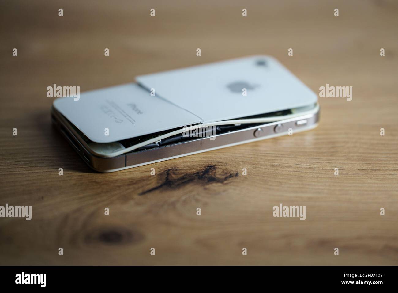 Kaunas, Lithuania - 2023 Marh 13: Iphone with exploded Lithium-ion ...