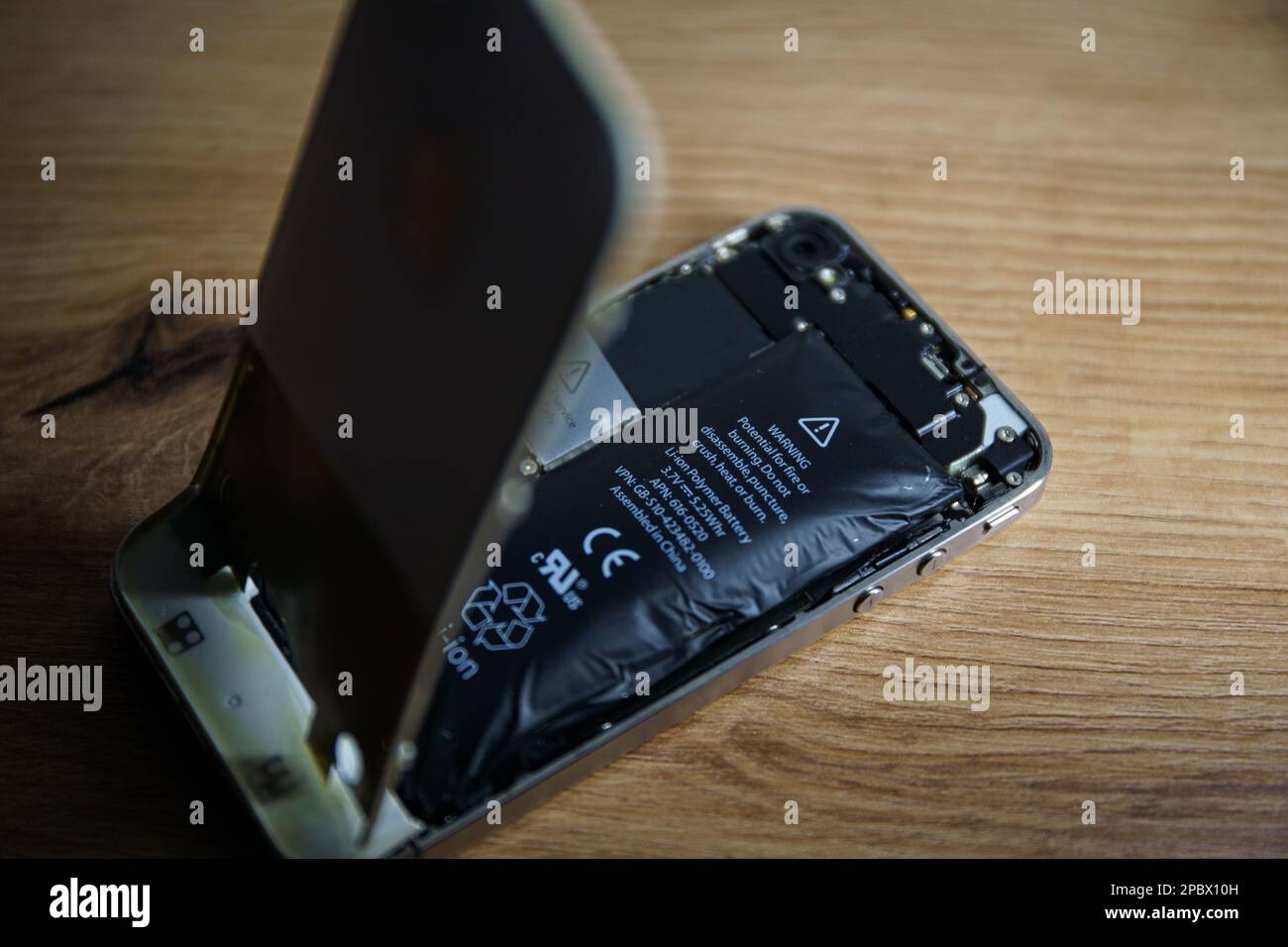 Kaunas, Lithuania - 2023 Marh 13: Iphone with exploded Lithium-ion ...