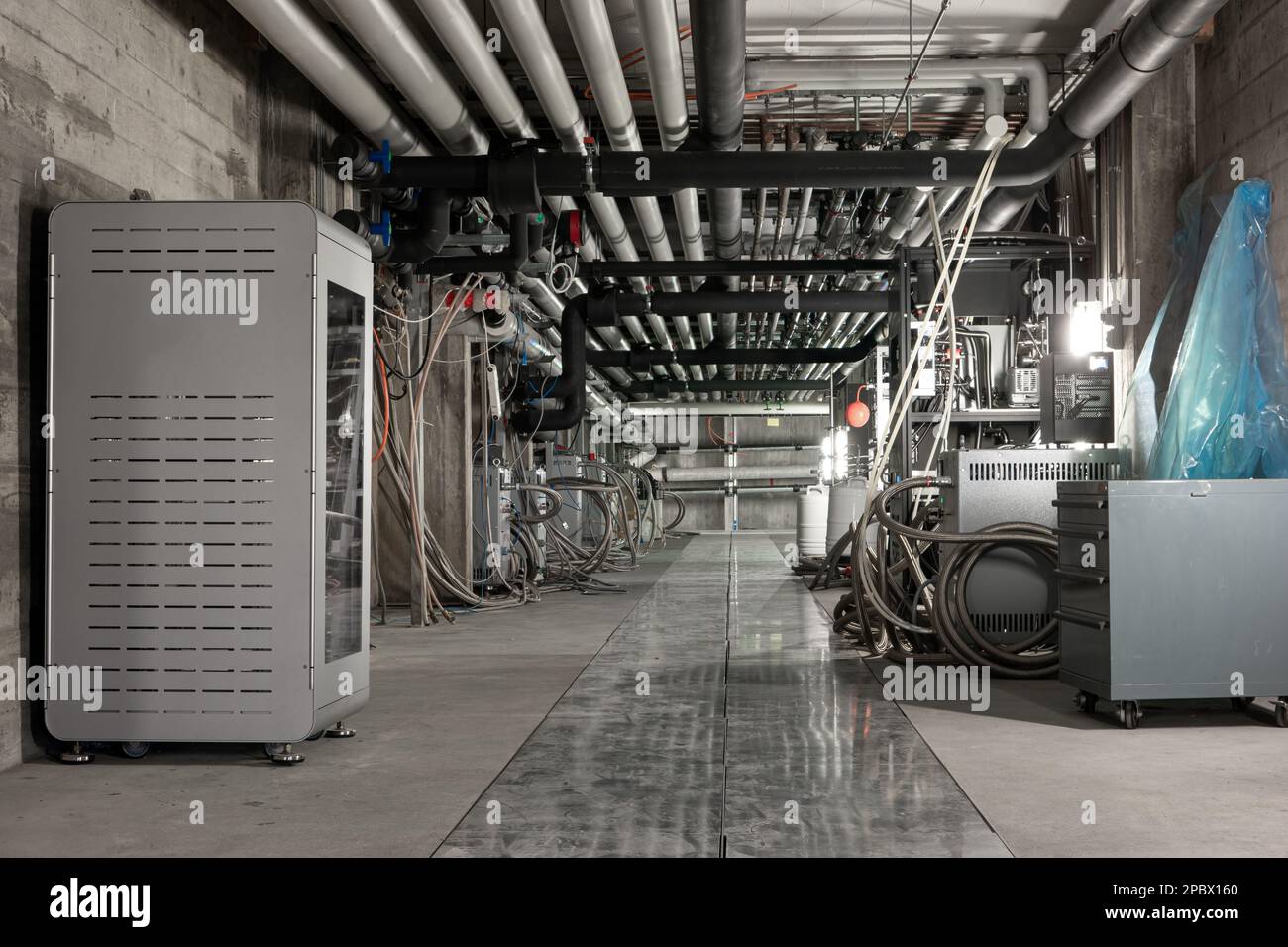 Ceiling mounted industrial pipelines and science laboratory machinery ...