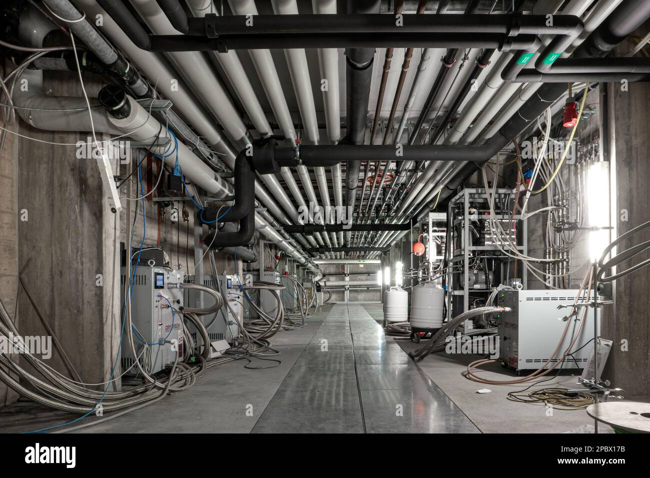 Ceiling mounted industrial pipelines and science laboratory machinery ...