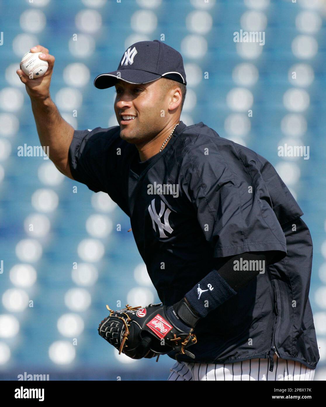 New York Yankees shortstop Derek Jeter runs down a base runner during ...