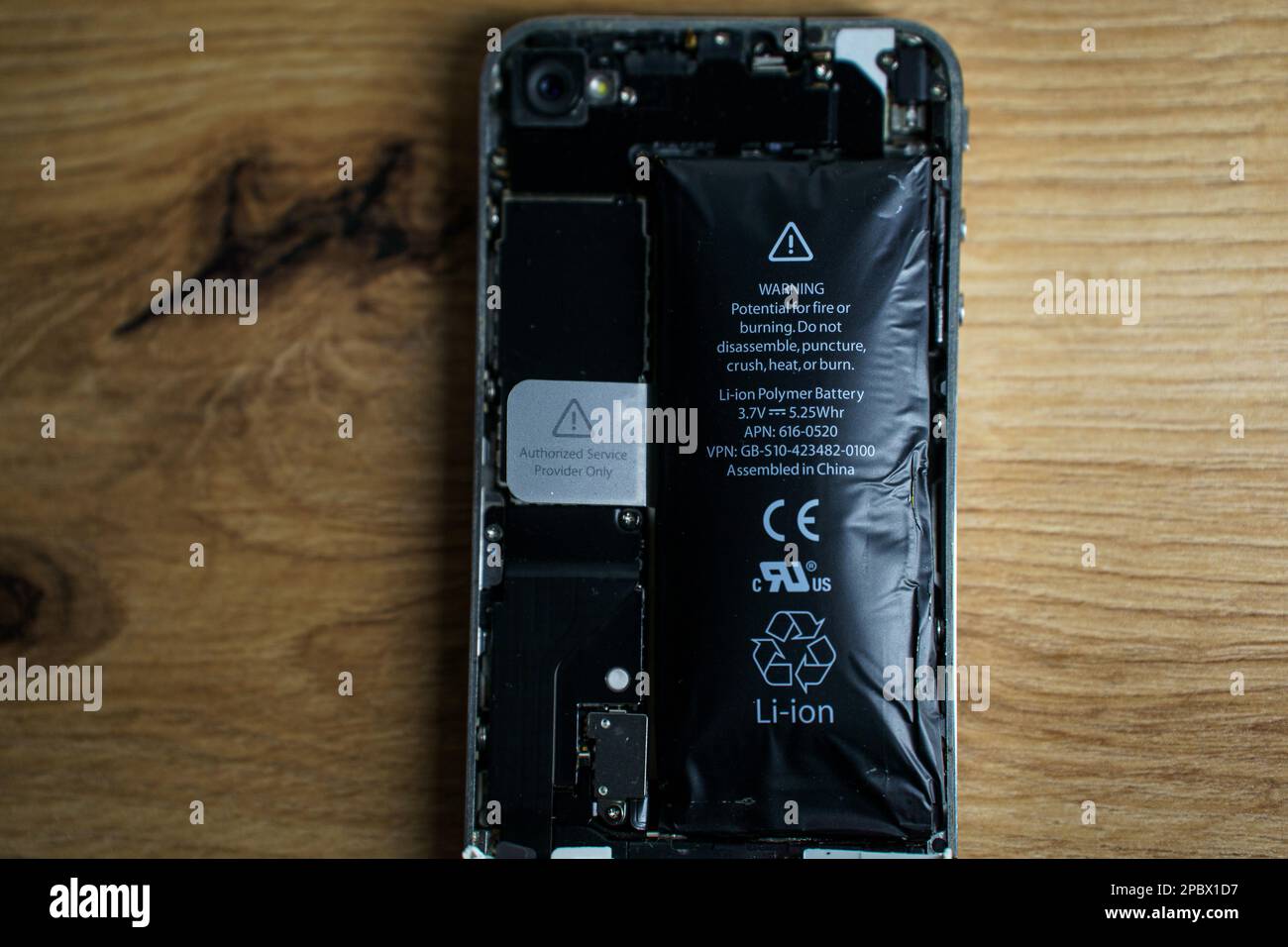 Kaunas, Lithuania - 2023 Marh 13: Iphone with exploded Lithium-ion ...