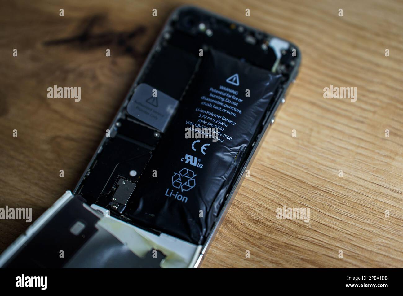Kaunas, Lithuania - 2023 Marh 13: Iphone with exploded Lithium-ion ...