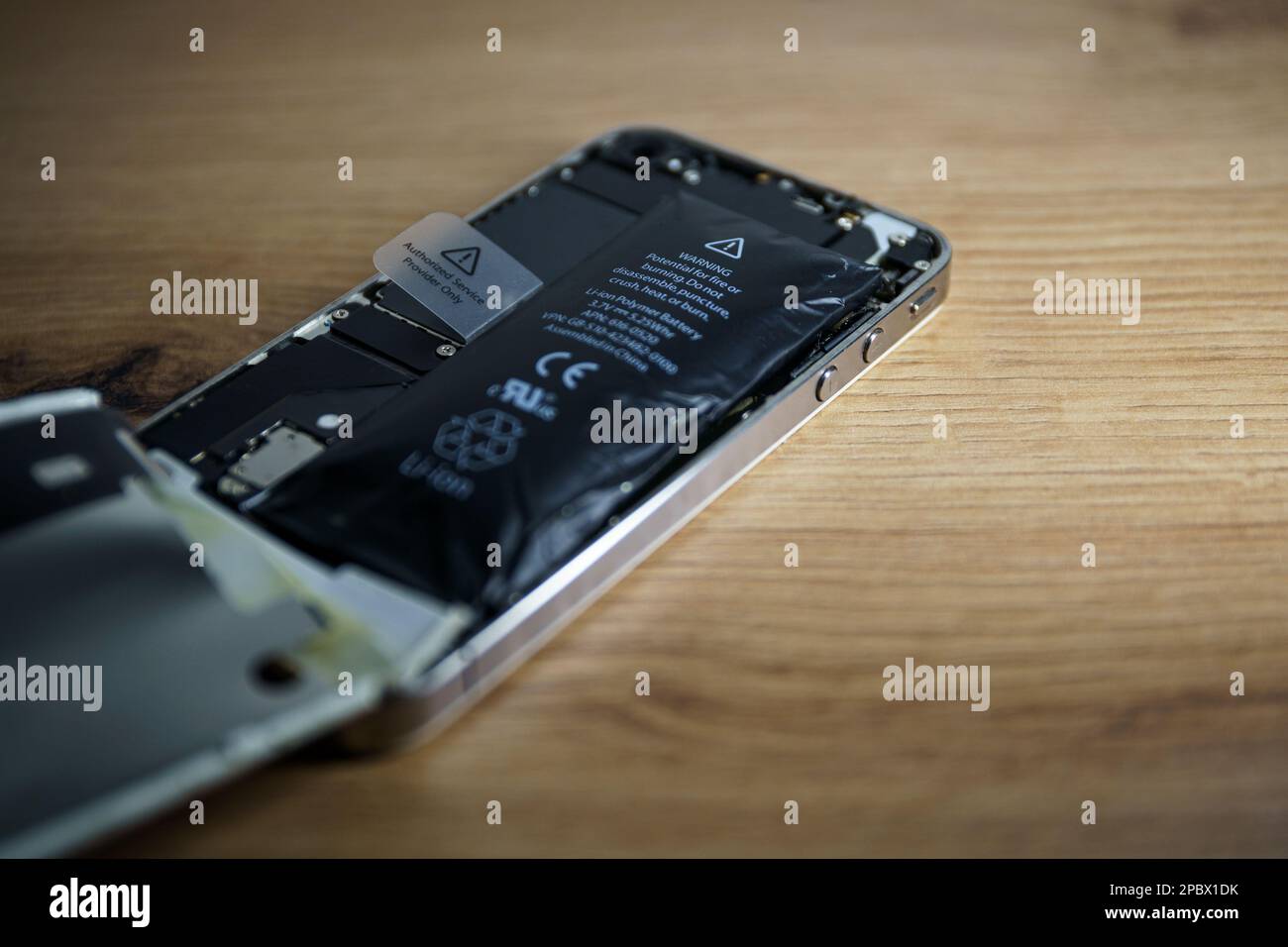 Kaunas, Lithuania - 2023 Marh 13: Iphone with exploded Lithium-ion ...