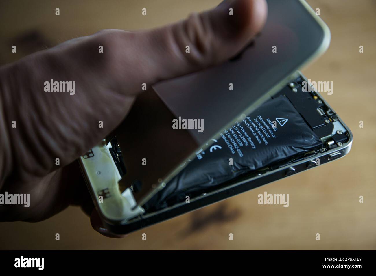 Kaunas, Lithuania - 2023 Marh 13: Iphone with exploded Lithium-ion ...