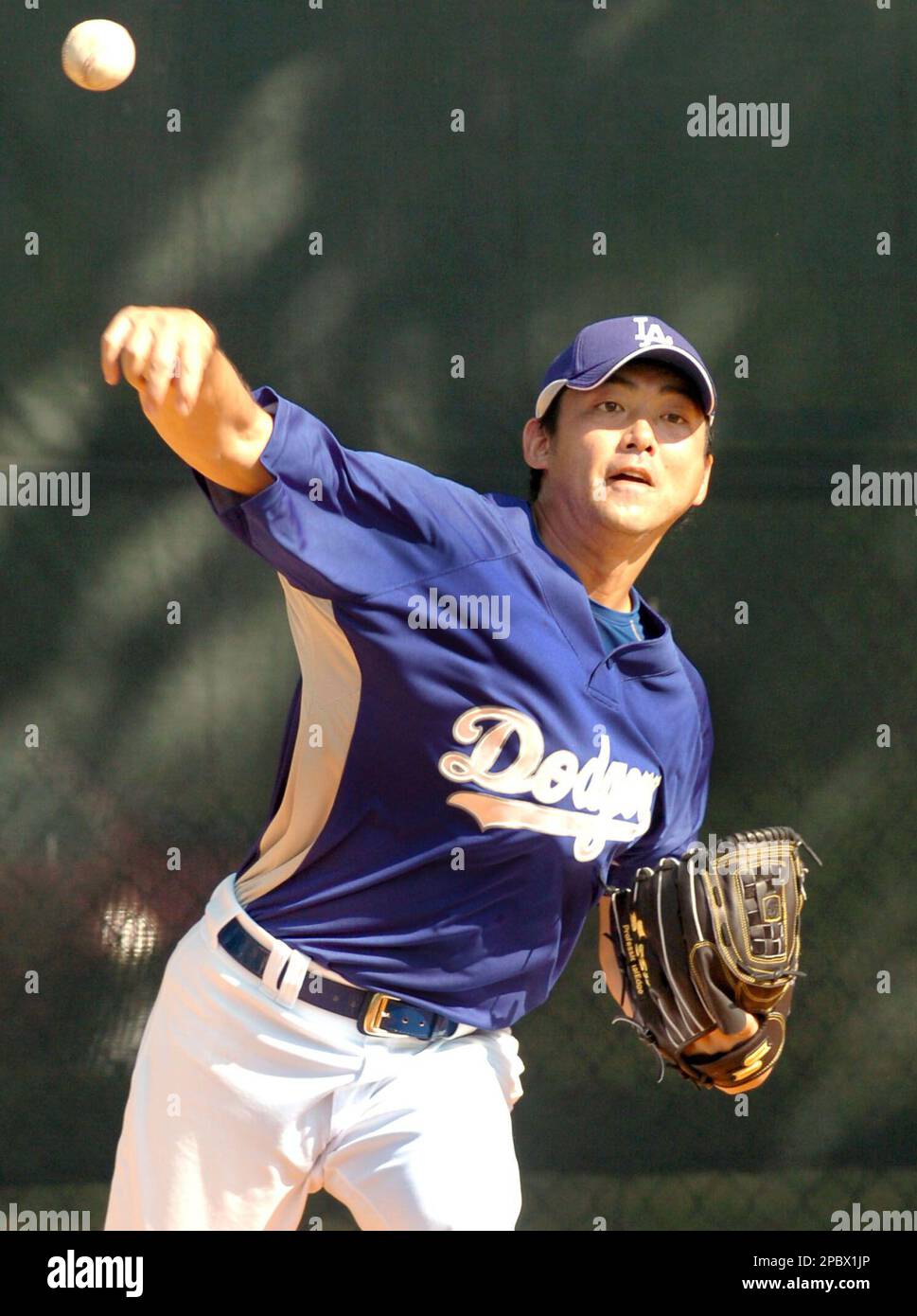 Los Angeles Dodgers pitcher Takashi Saito of Japan throws in the ...