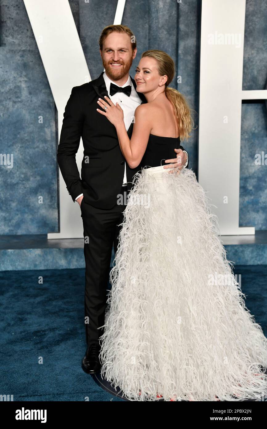 Wyatt Russell, left, and Meredith Hagner arrive at the Vanity Fair ...