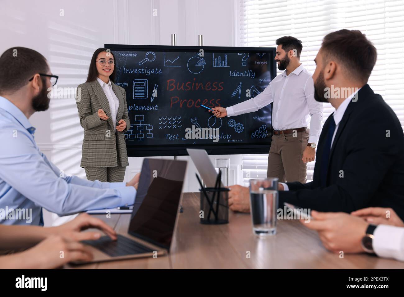 Businesspeople in training process hi-res stock photography and images ...