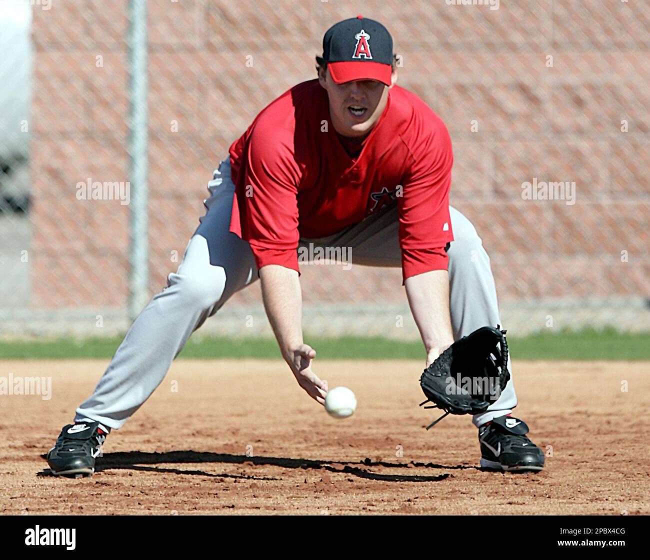 Los Angeles Angels pitcher John Lackey fields a ground ball as he ...