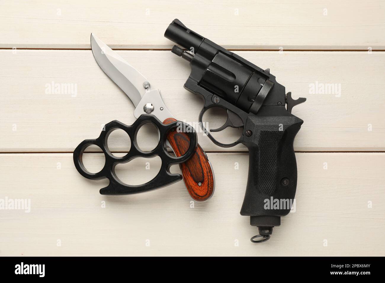 Brass Knuckles And Guns Wallpaper