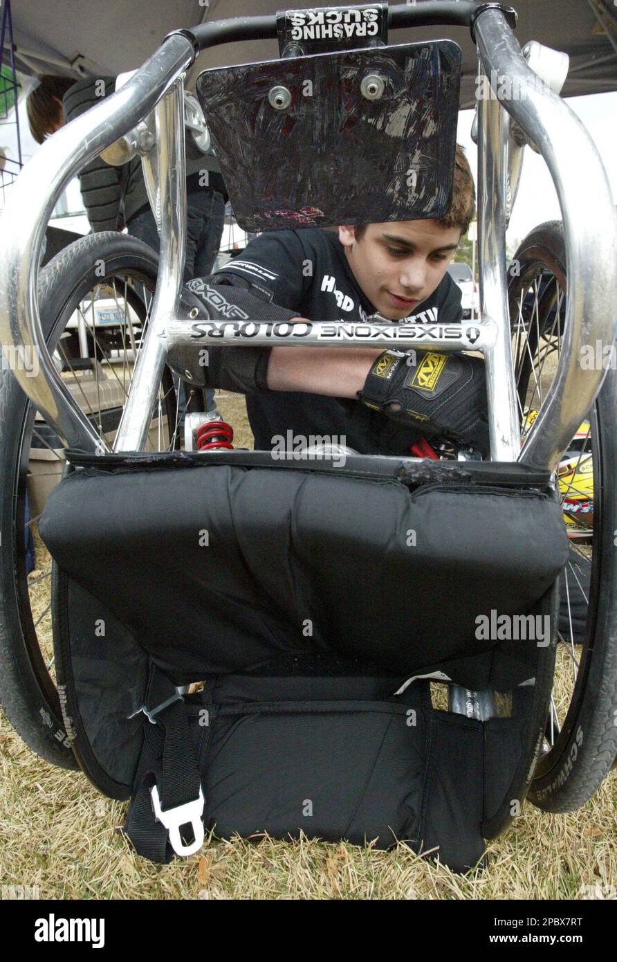 Aaron Fotheringham, 15, Vegas AMJam Team Member, tighten bolts on his ...