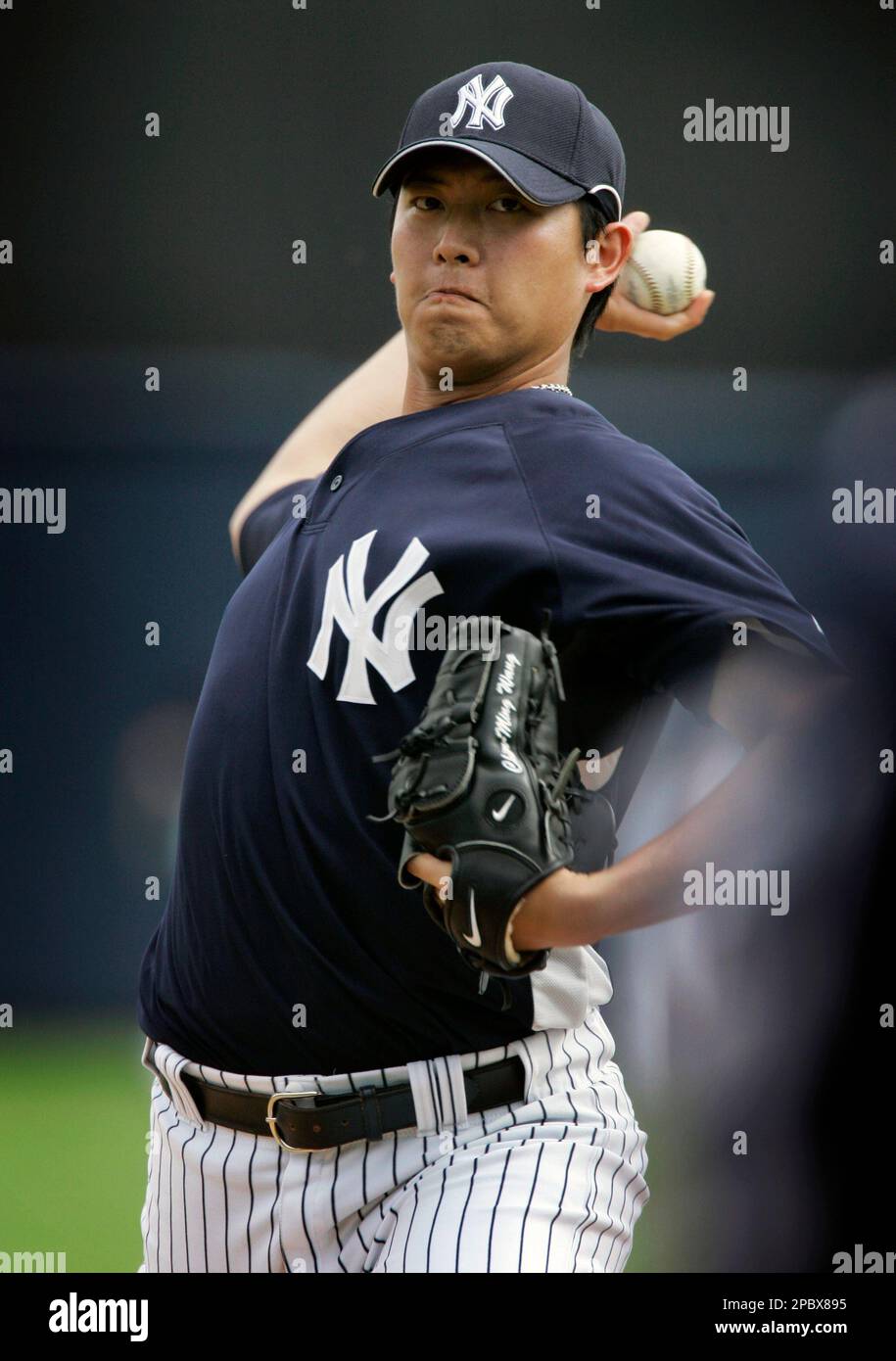 New York Yankees pitcher Chien-Ming Wang, of Taiwan, throws live ...