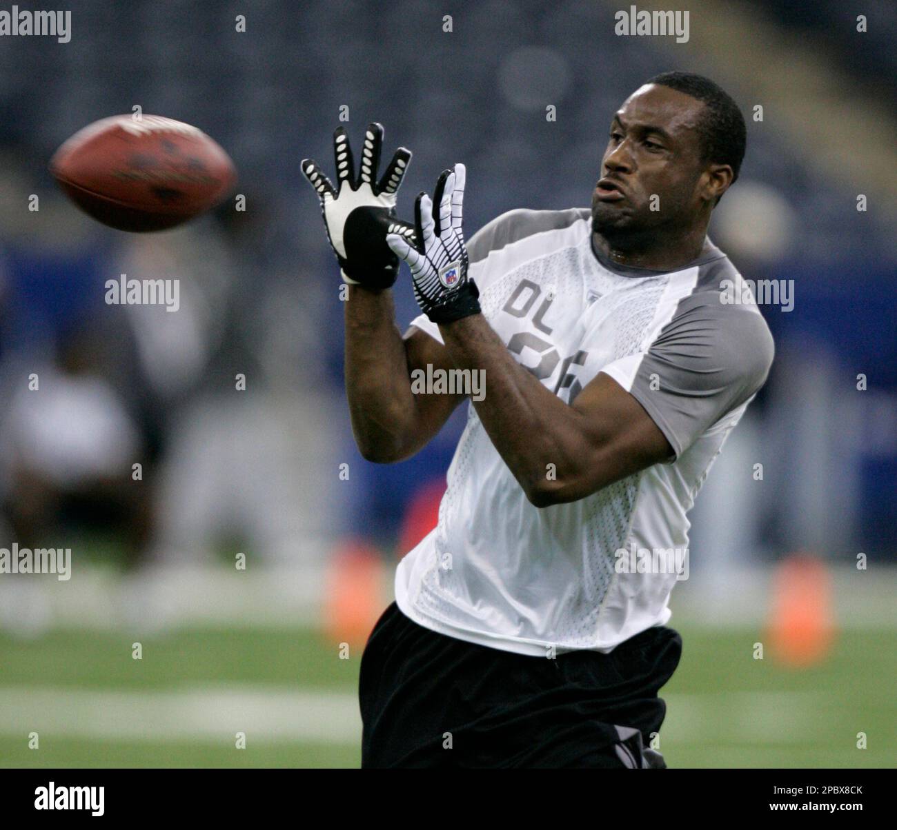 Defensive lineman Jarvis Moss of Florida makes a catch during workouts ...